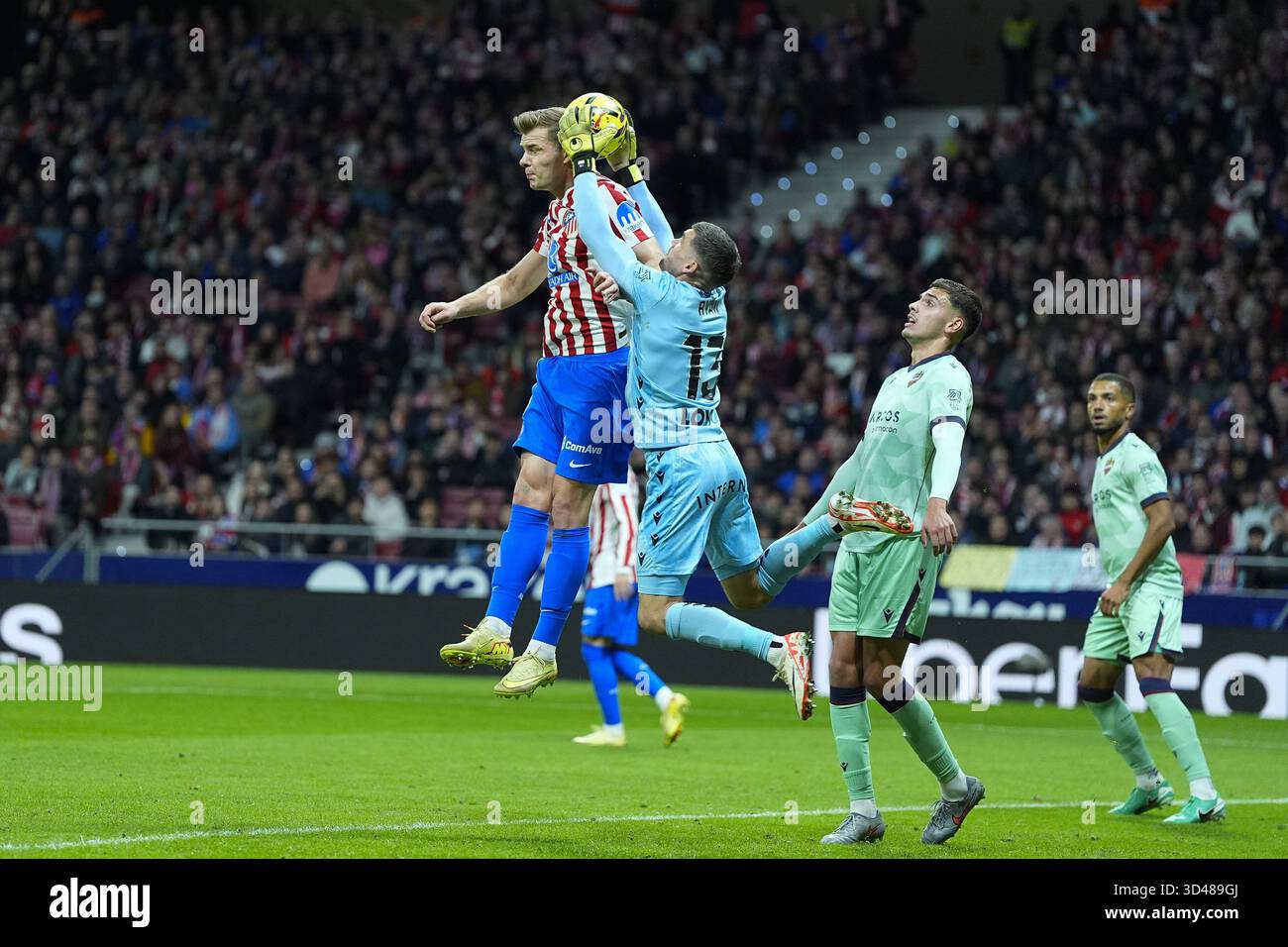Alexander Sorloth of Atletico de Madrid and Mathew Ryan of Levante ...