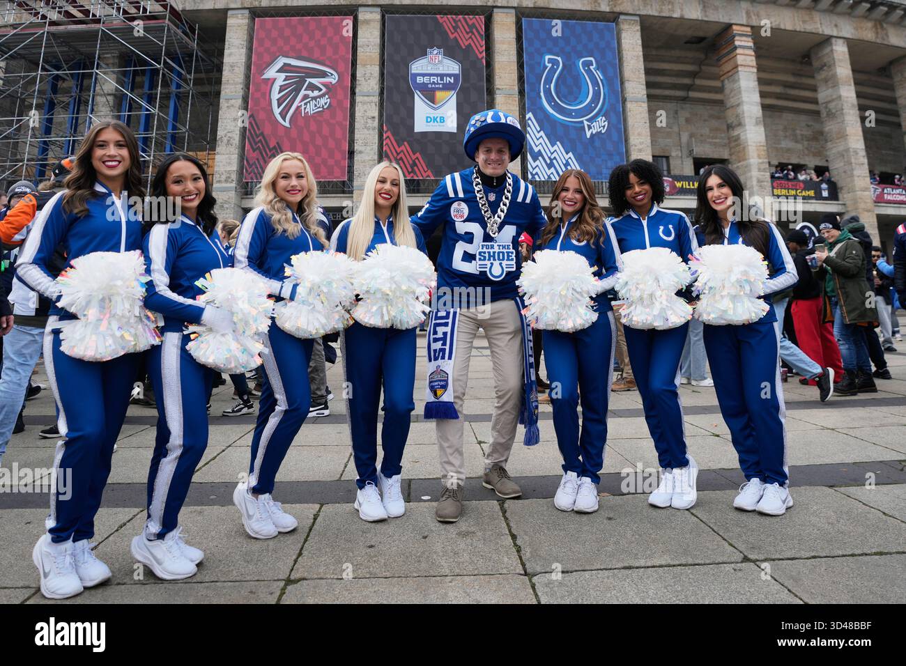 Stefan Schultz, official Colts fan on the year, poses with cheerleaders ...