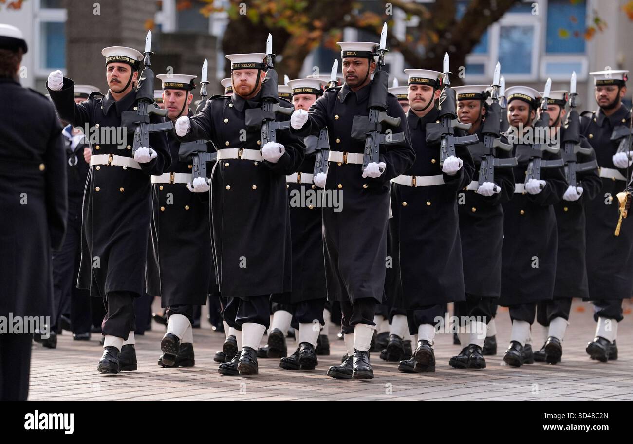 Members of the Royal Navy march into Guildhall Square in Portsmouth ...