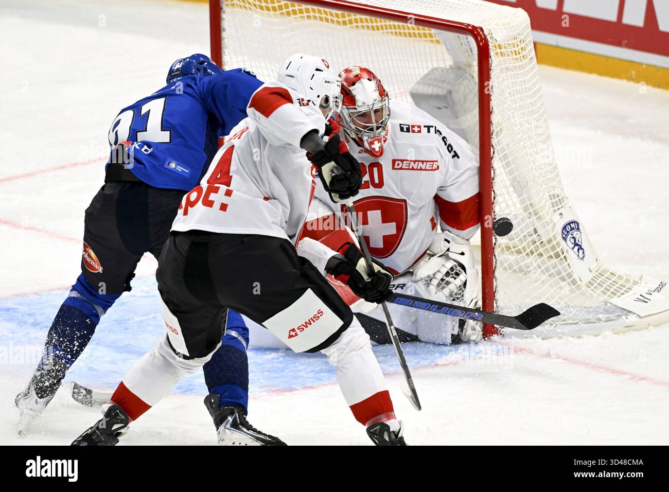 Goalkeeper Reto Berra of Switzerland makes a save during the Euro ...