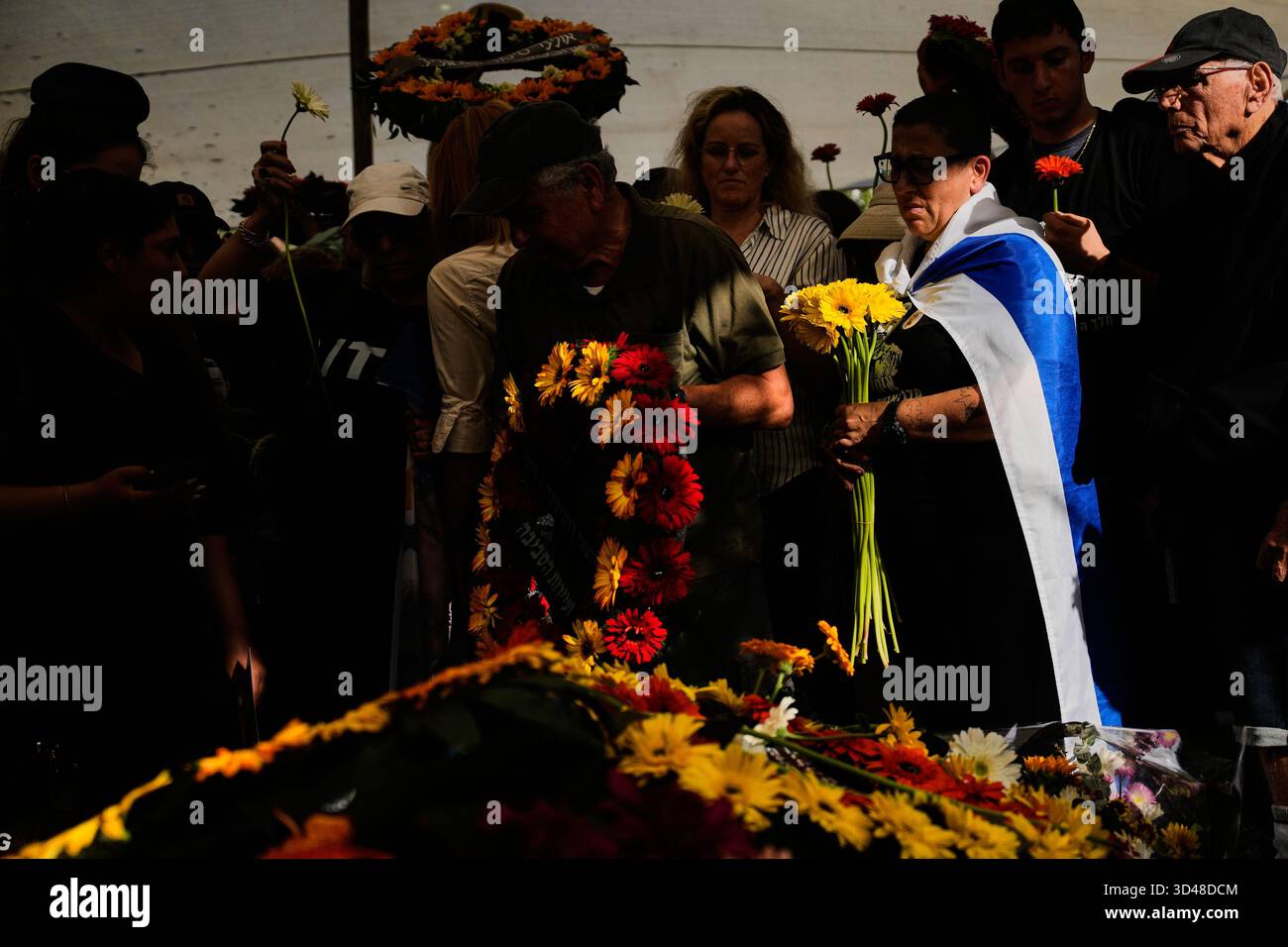 Mourners attend the funeral of slain hostage Israeli-American Staff Sgt ...