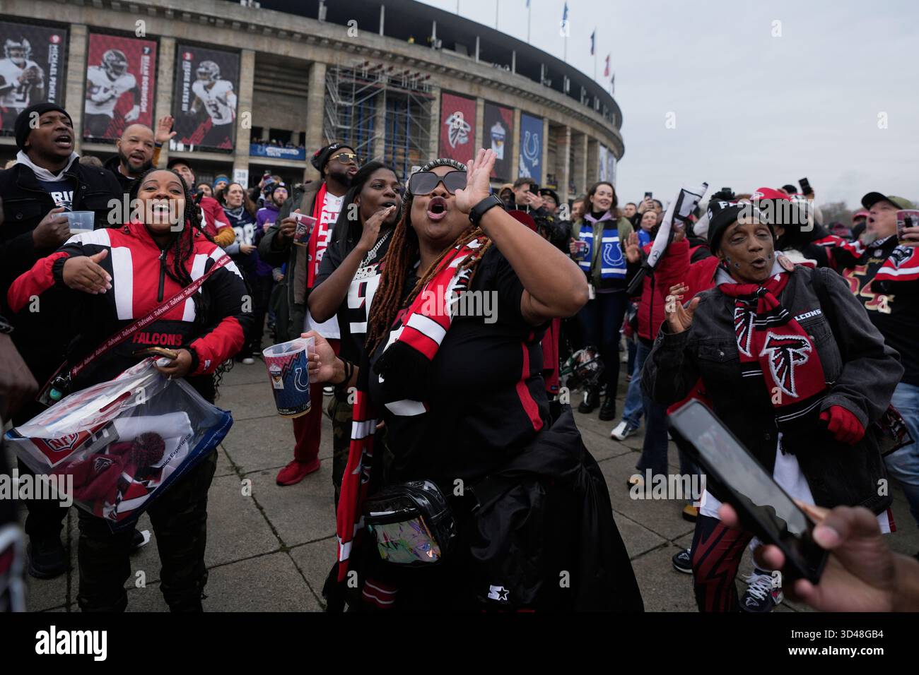 Falcons fans cheer outside the Olympic stadium ahead of the upcoming ...