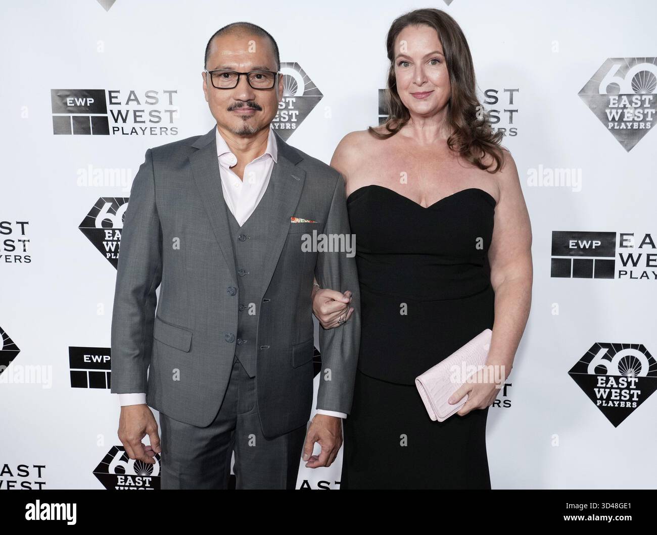 (L-R) Jon Jon Briones and Megan Briones at the East West Players 60th ...