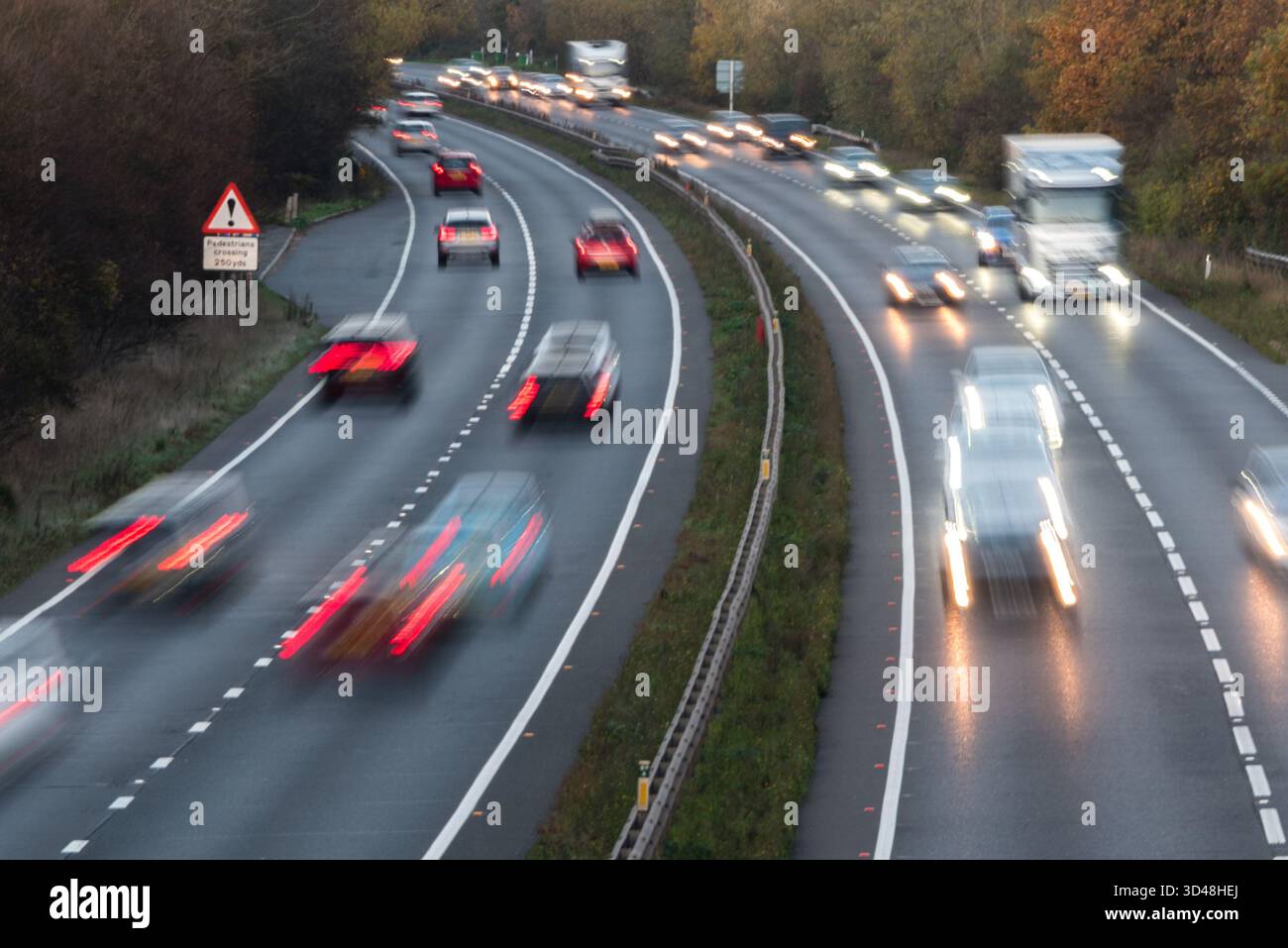 UK moving traffic on a dual carriageway road with cars Stock Photo - Alamy