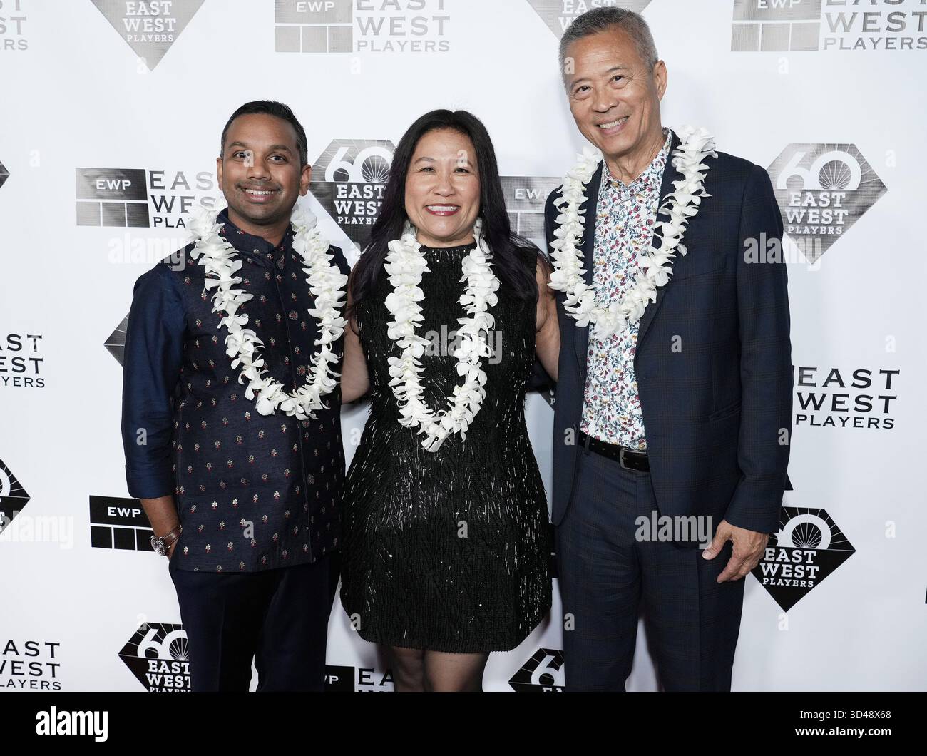 (L-R) Snehal Desai, Lily Tung Crystal and Tim Dang at the East West ...