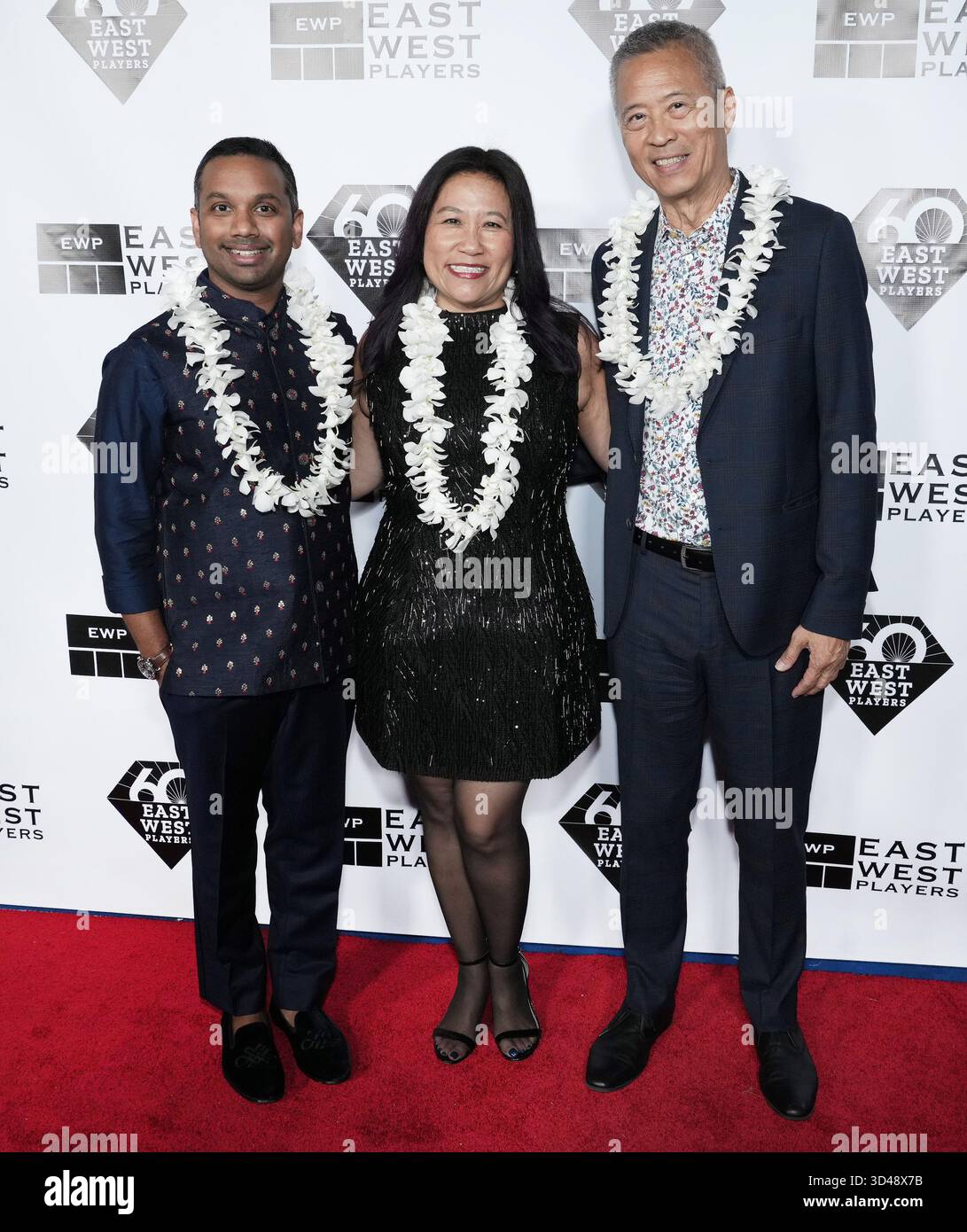 (L-R) Snehal Desai, Lily Tung Crystal and Tim Dang at the East West ...