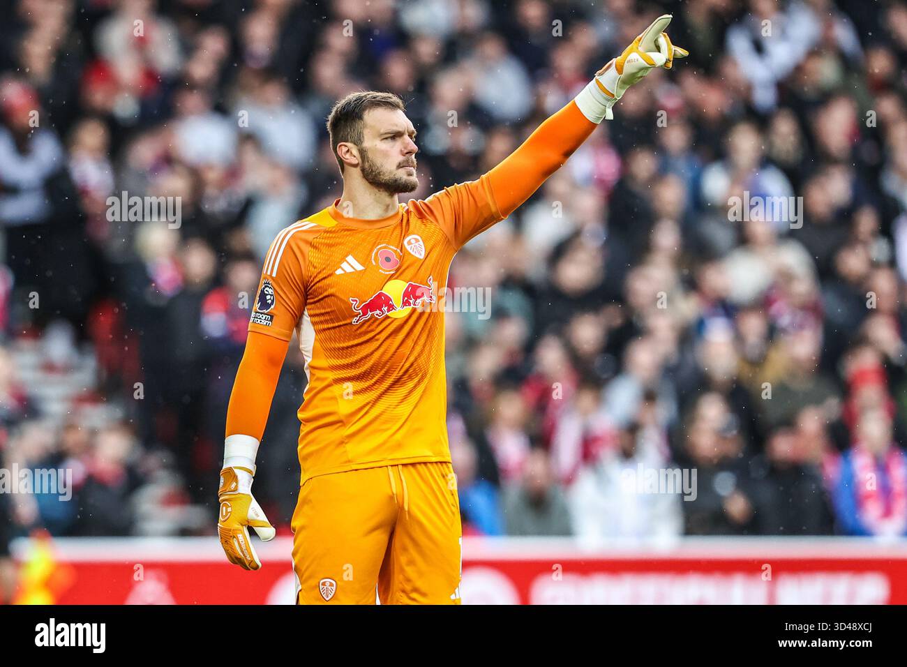 Leeds United goalkeeper Lucas Perri gives his team instructions during ...