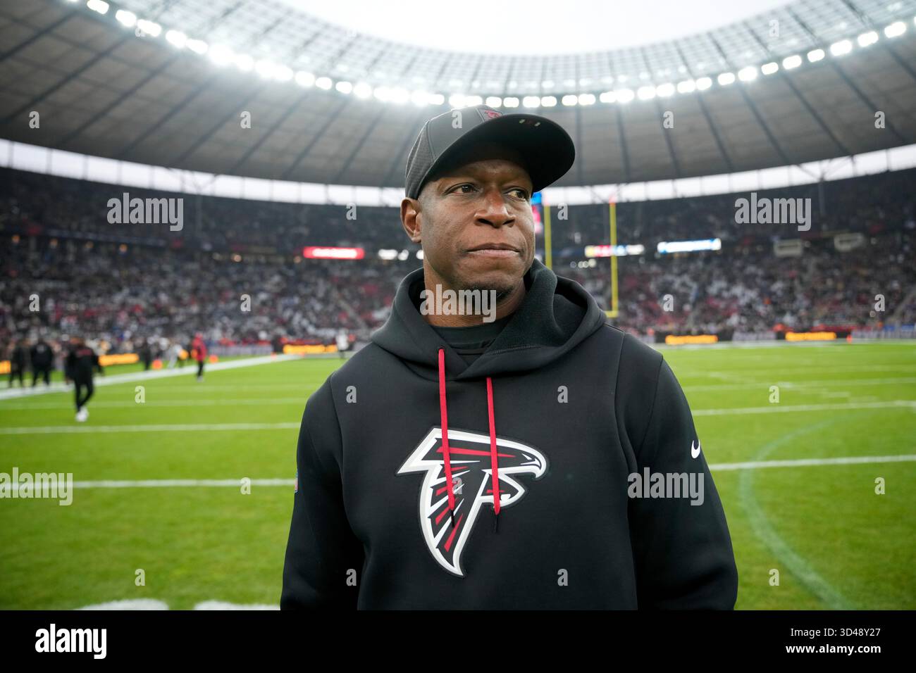 Atlanta Falcons head coach Raheem Morris walks on the field before an ...