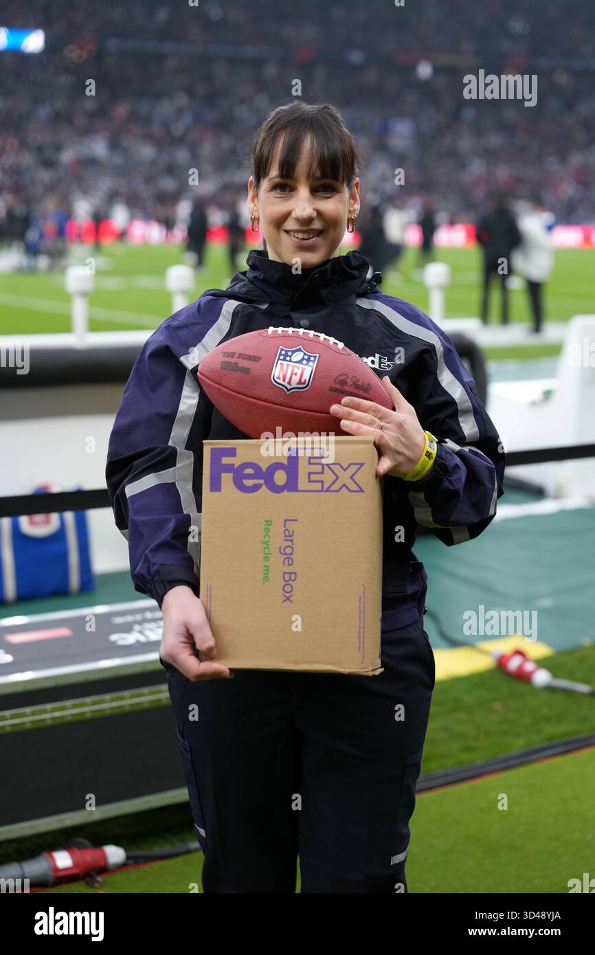 The game ball is delivered by FedEx before an NFL football game between ...