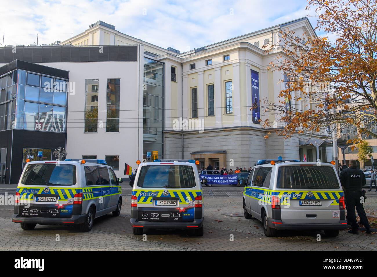 09 November 2025, Saxony-Anhalt, Magdeburg: Police vehicles are parked ...