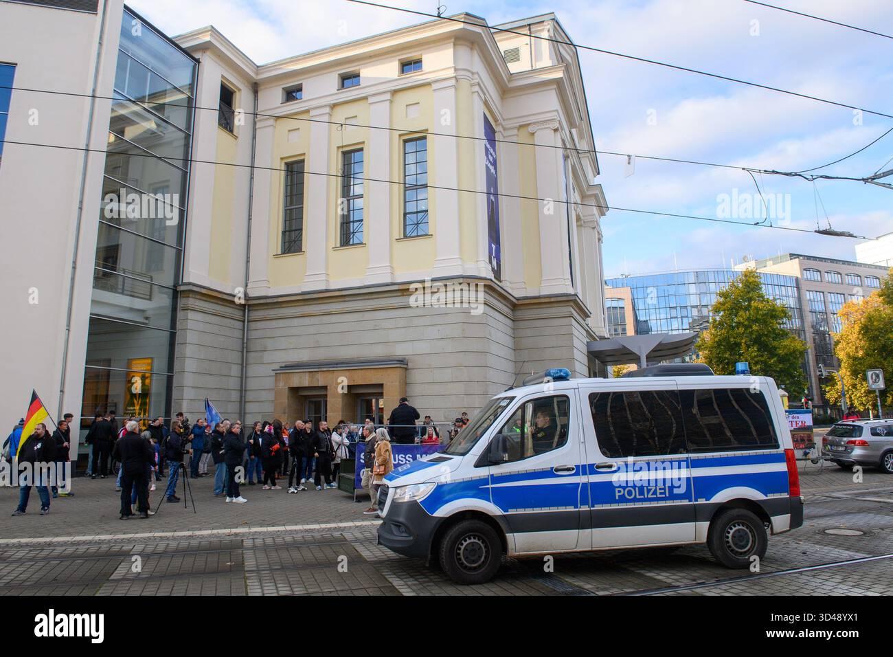09 November 2025, Saxony-Anhalt, Magdeburg: A police vehicle drives ...