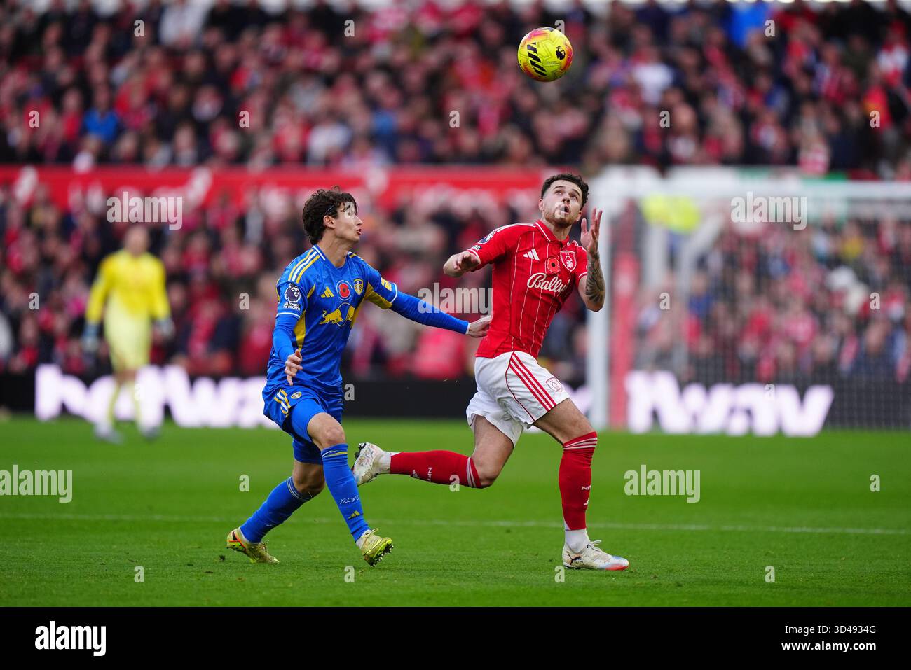 Leeds United's Brenden Aaronson (left) and Nottingham Forest's Neco ...