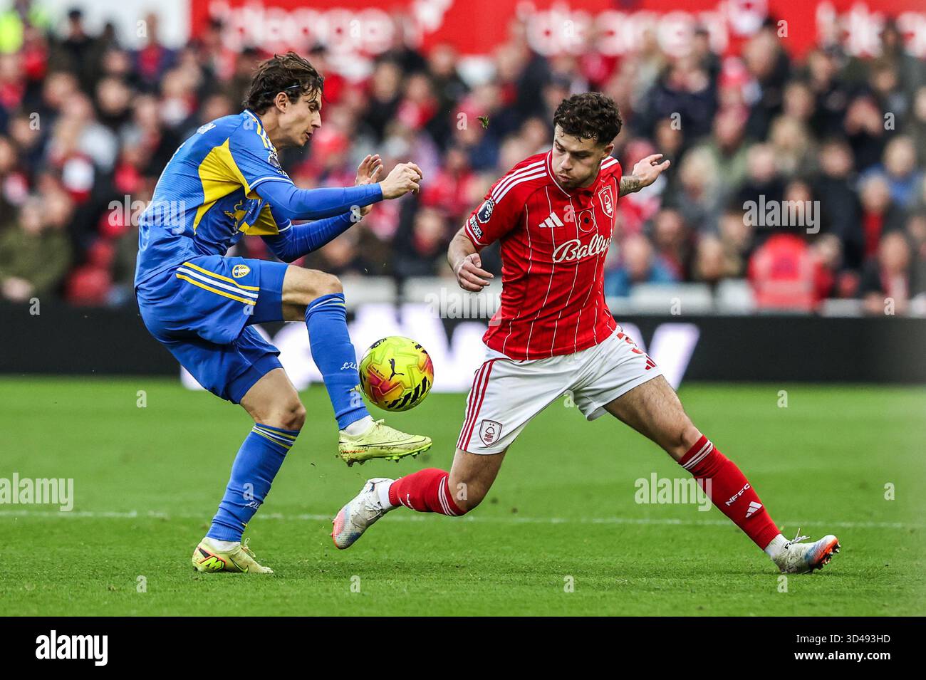 Brenden Aaronson of Leeds United and Neco Williams of Nottingham Forest ...