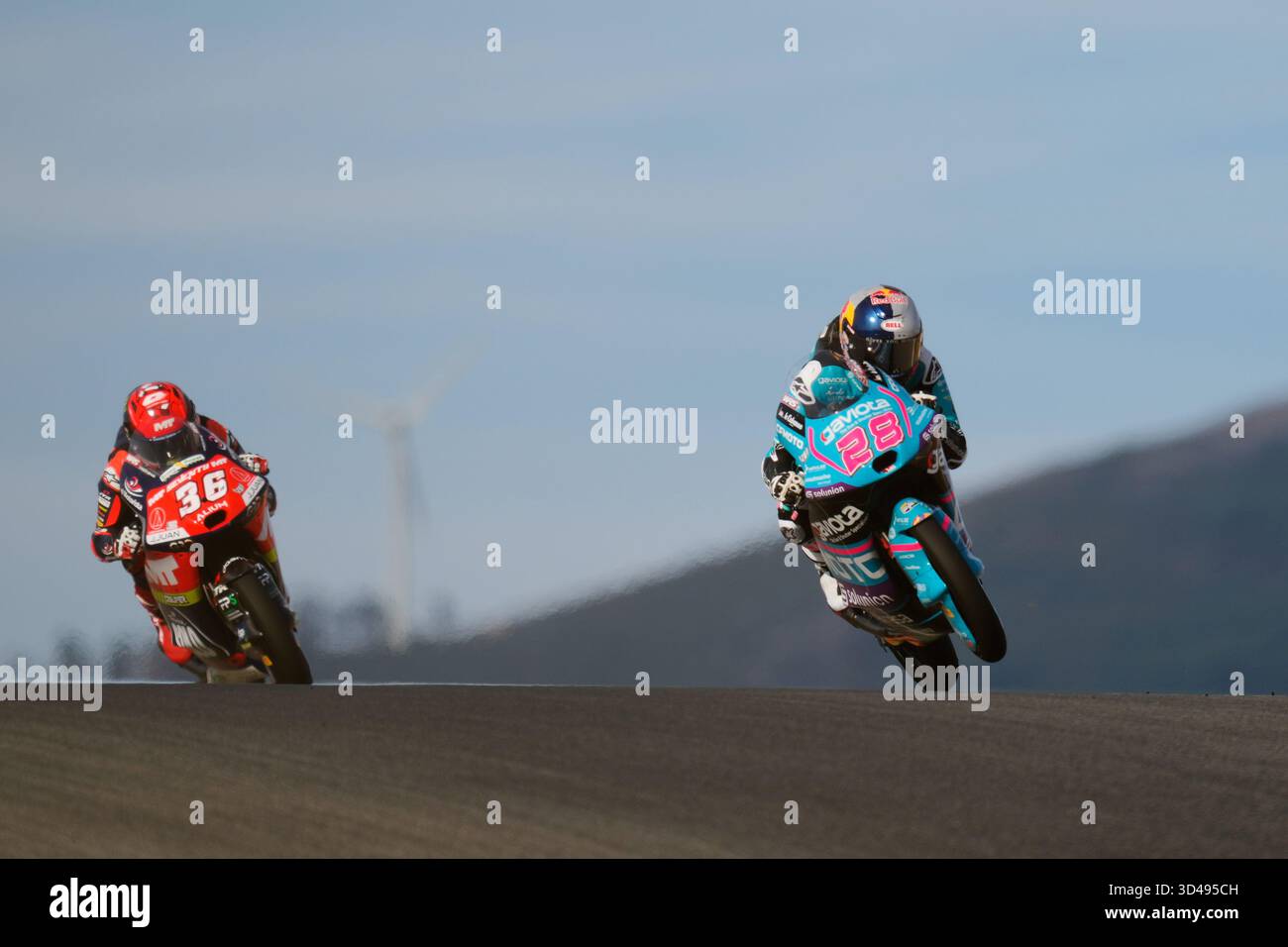 Spain's rider Maximo Quiles, right, leads countryman Angel Piqueras during the Moto3 race of the ...