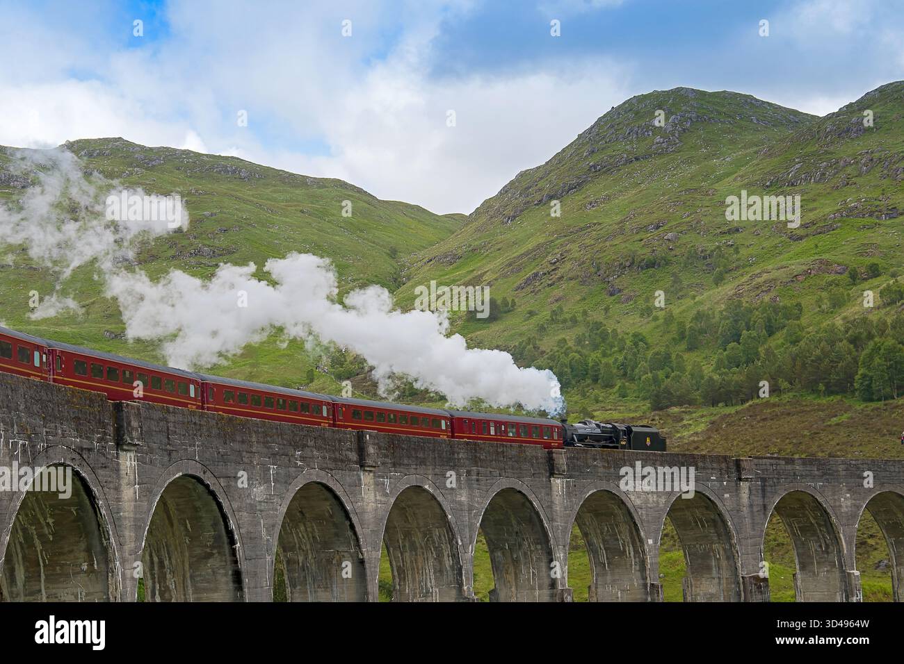 The Jacobite Steam Train crossing the iconic Scottish Highlands ...