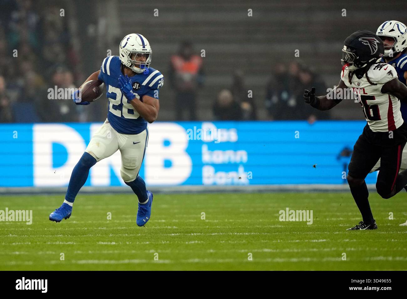 Indianapolis Colts running back Jonathan Taylor (28) carries the ball past Atlanta Falcons ...