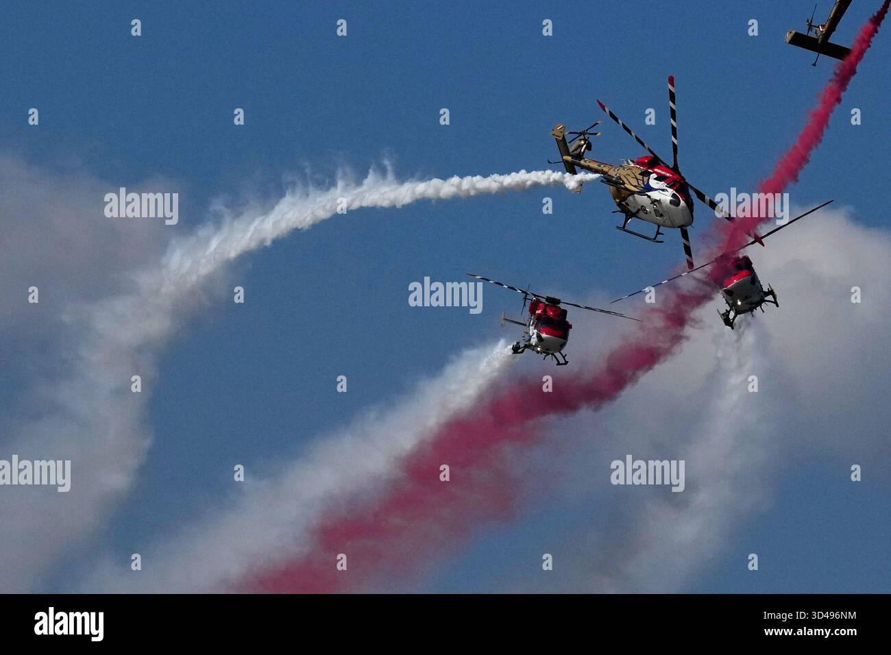 Sarang, a helicopter display team, performs in a formation during 93rd ...