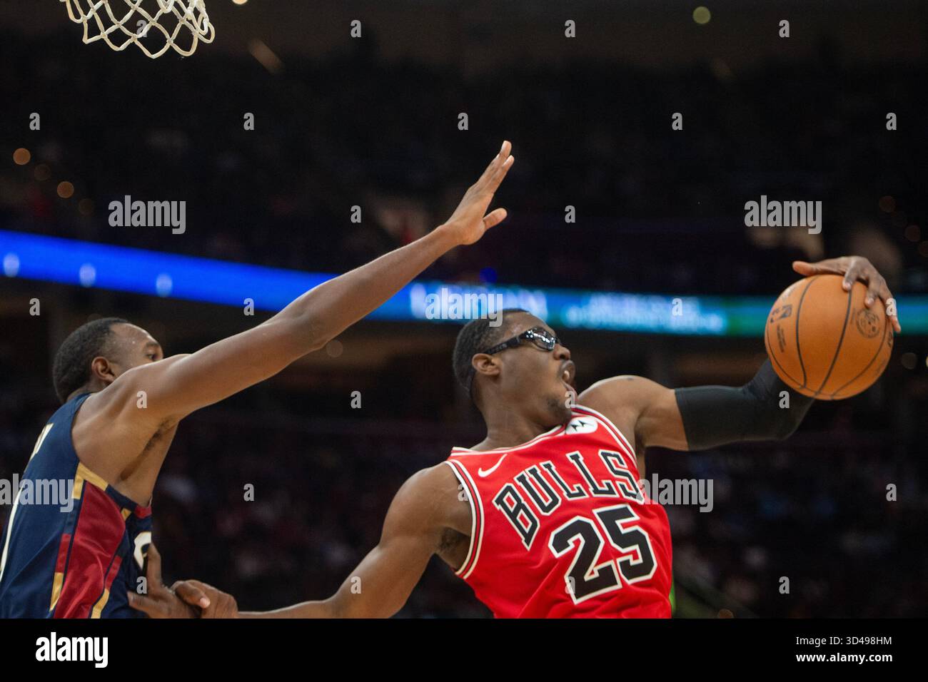 Chicago Bulls' Jalen Smith (25) grabs a rebound in front of Cleveland ...