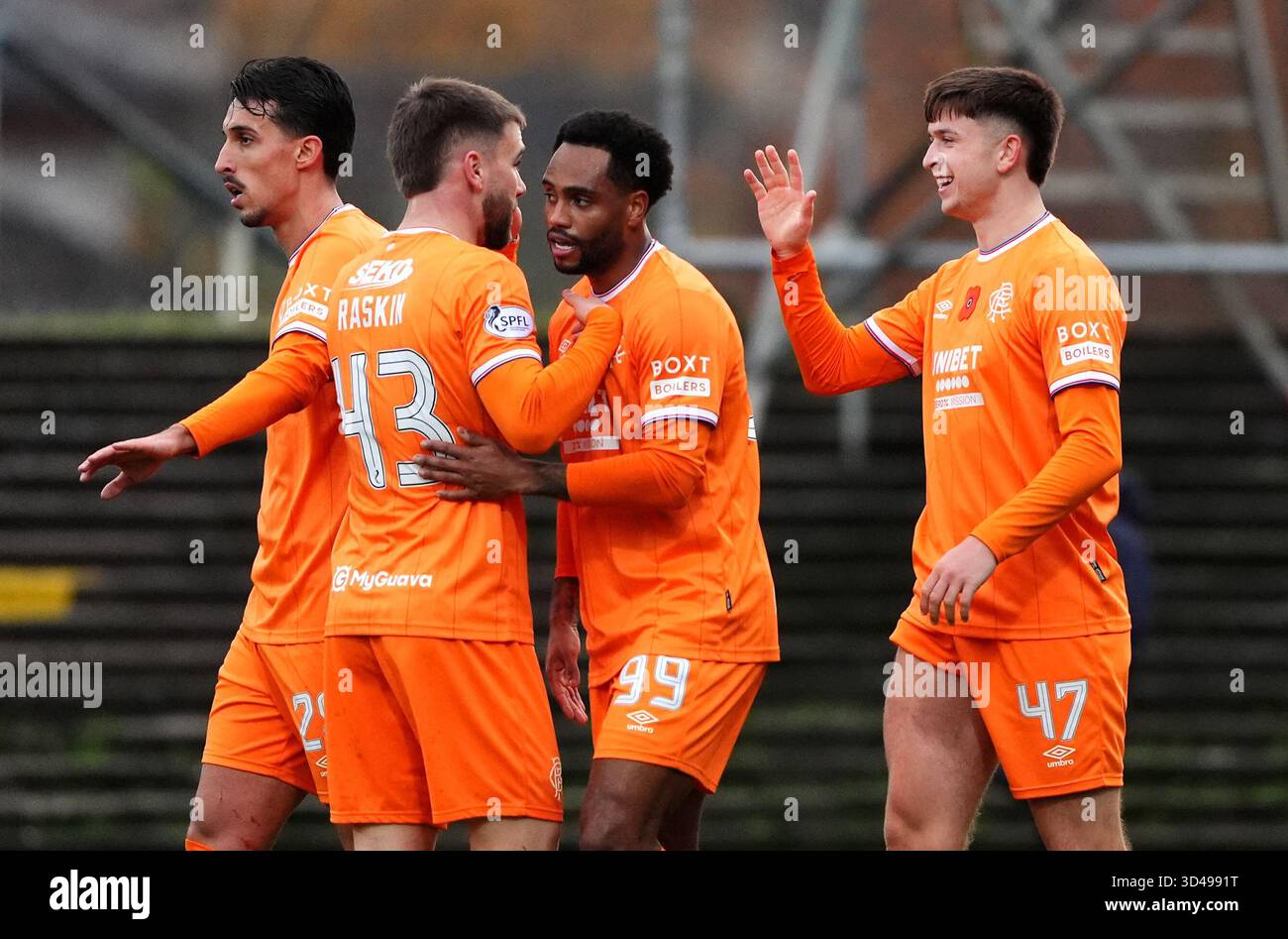 Rangers' Mikey Moore (right) celebrates scoring their side's second ...