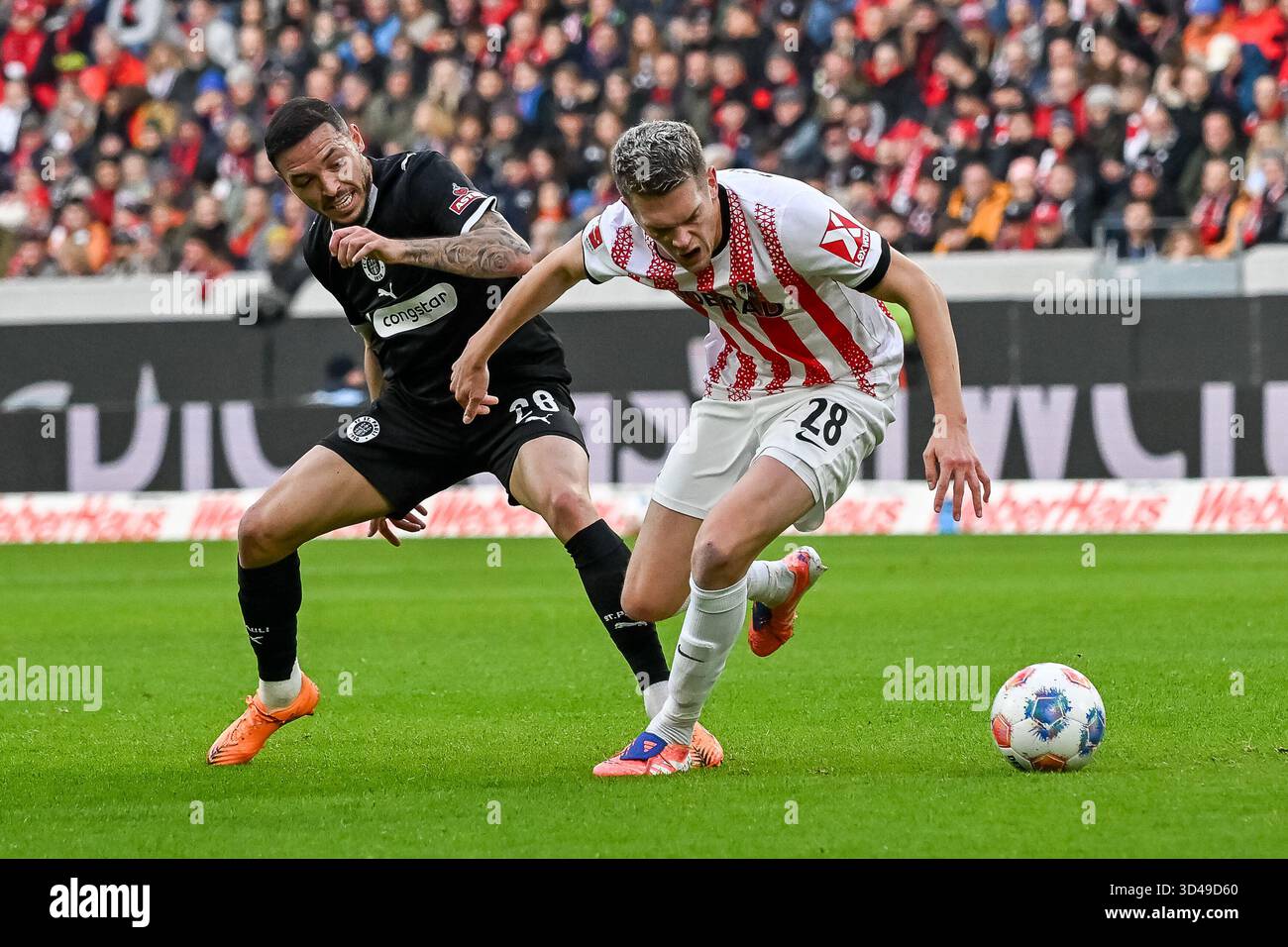 Mathias Pereira Lage (FC St. Pauli Hamburg, #28) fouls Matthias Ginter ...