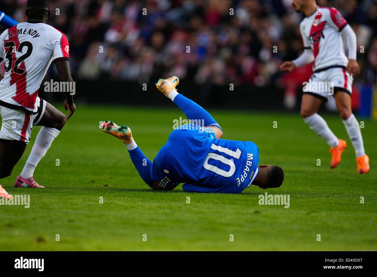 Real Madrid's Kylian Mbappe falls during a Spanish La Liga soccer match ...