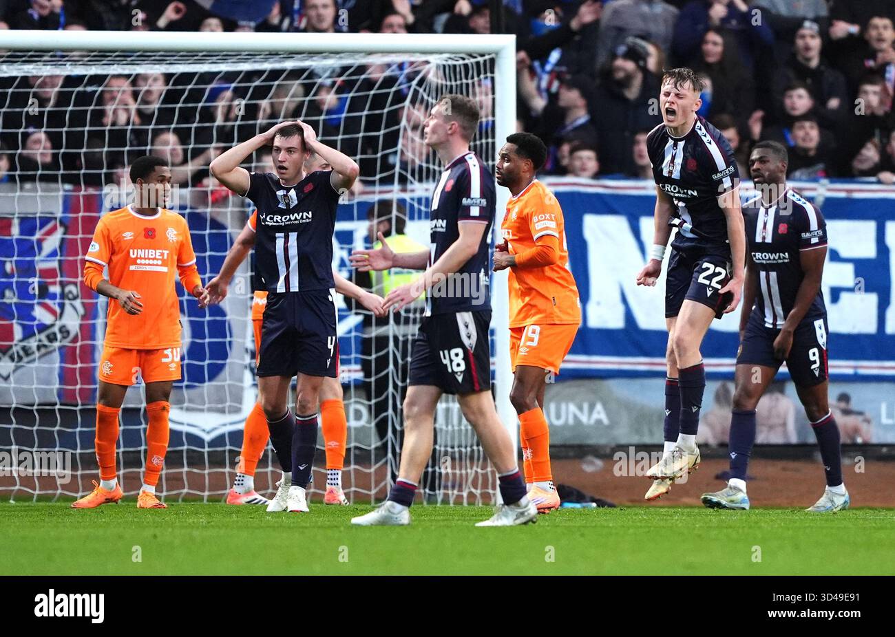 Dundee's Luke Graham (second right) rues a missed chance during the ...