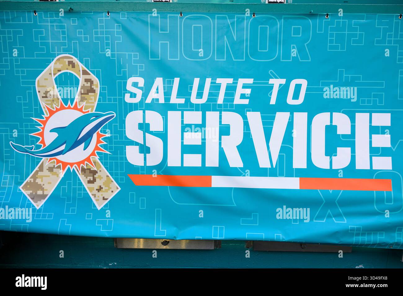 A Miami Dolphins Salute To Service banner is on display before an NFL ...