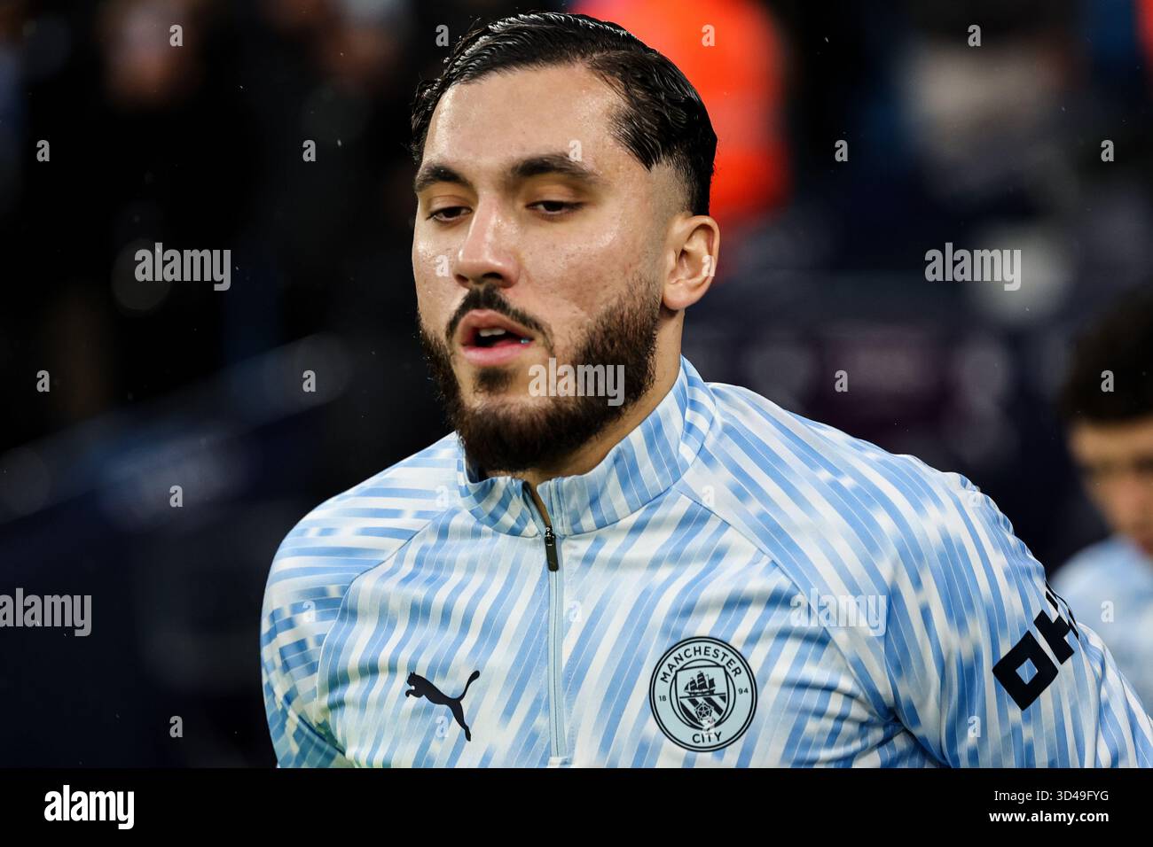 Rayan Cherki of Manchester City warms up ahead of the Premier League match Manchester City vs ...