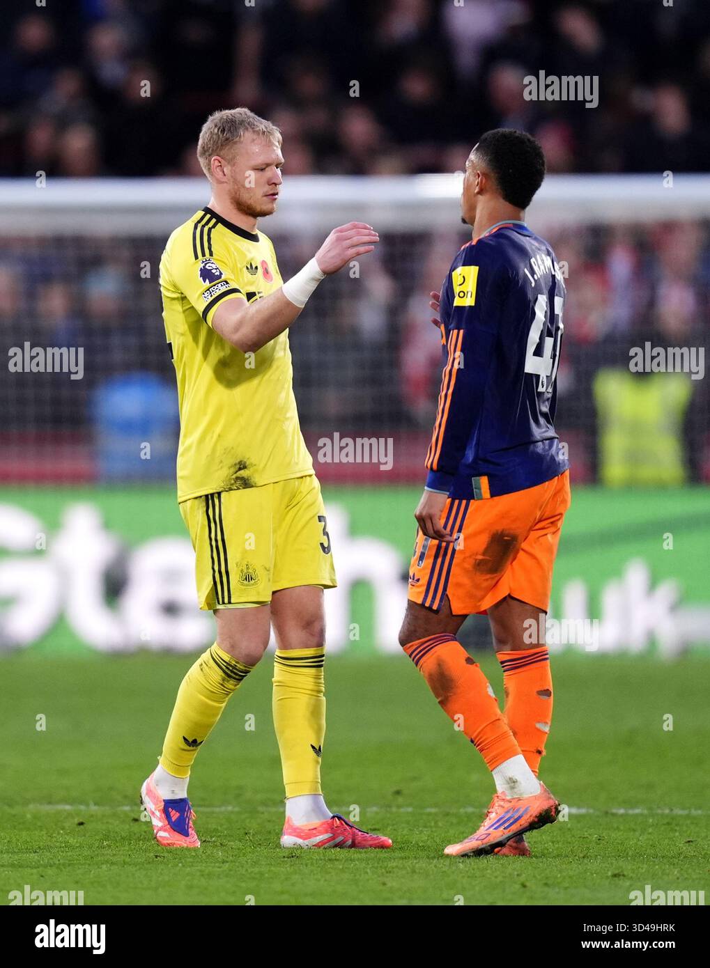 Newcastle United goalkeeper Aaron Ramsdale and Jacob shake hands after ...