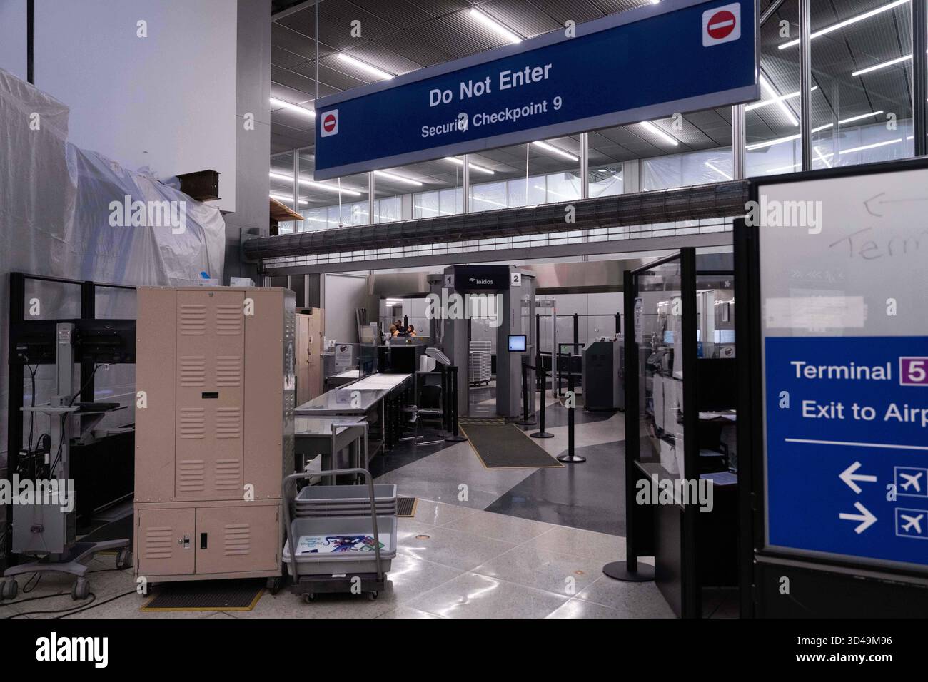 A Transportation Security Administration (TSA) security checkpoint sits ...