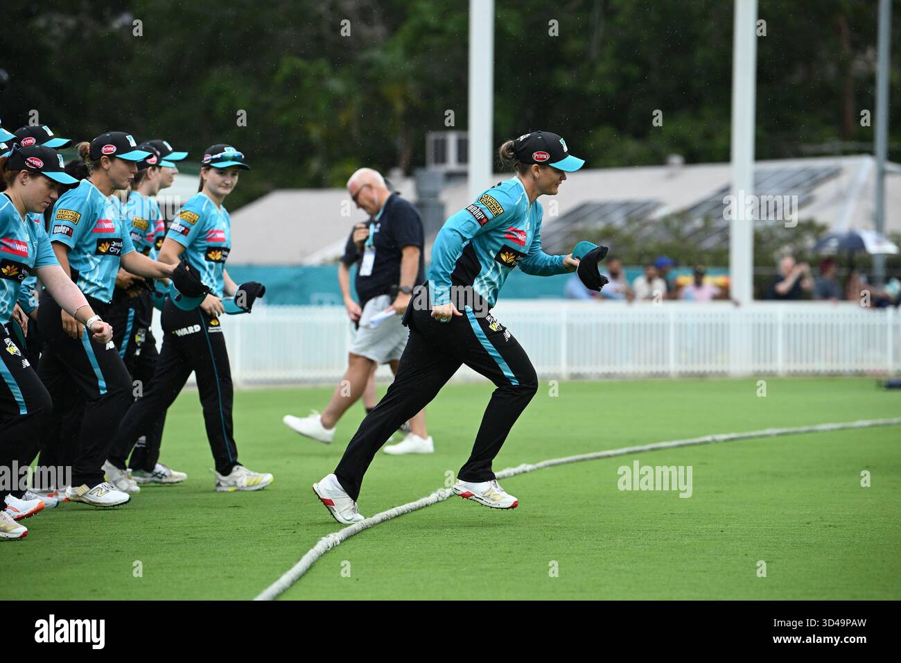 Brisbane Heat players run out during the WBBL opening season game ...