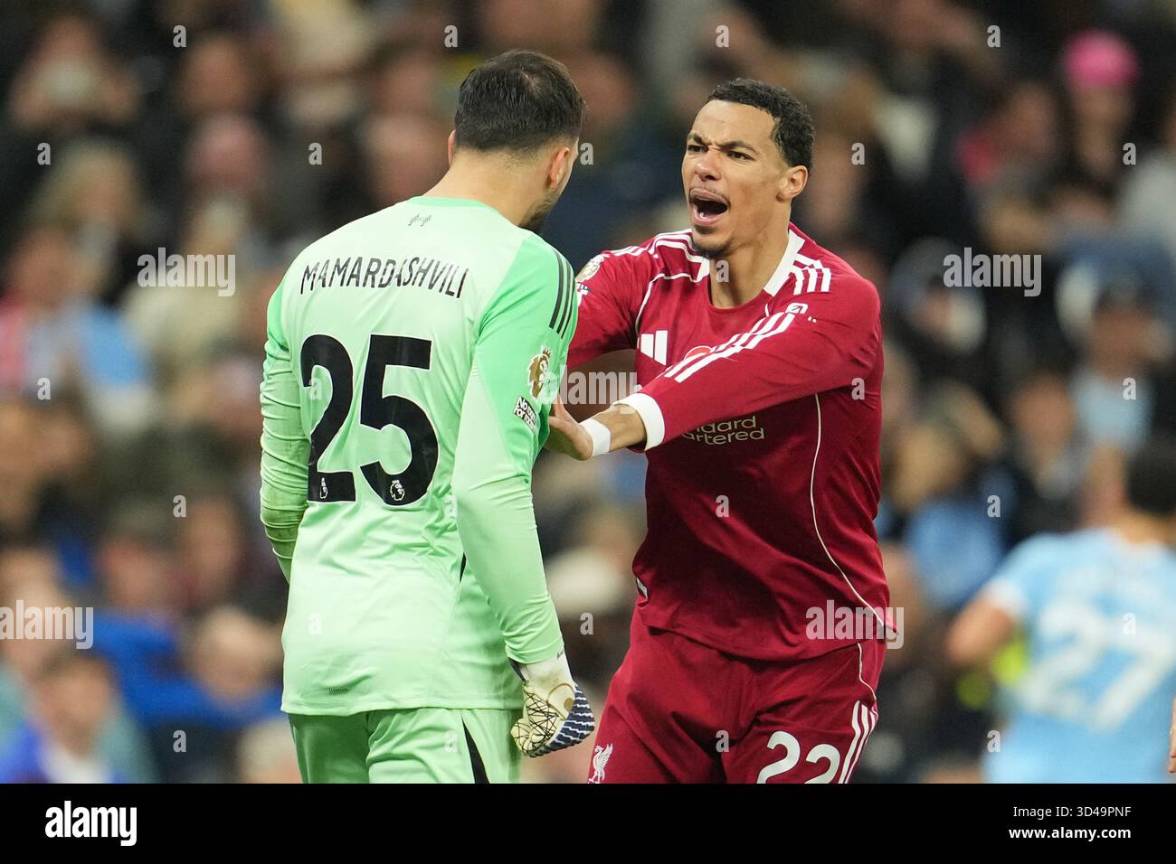 Liverpool's goalkeeper Giorgi Mamardashvili, left, and Liverpool's Hugo ...