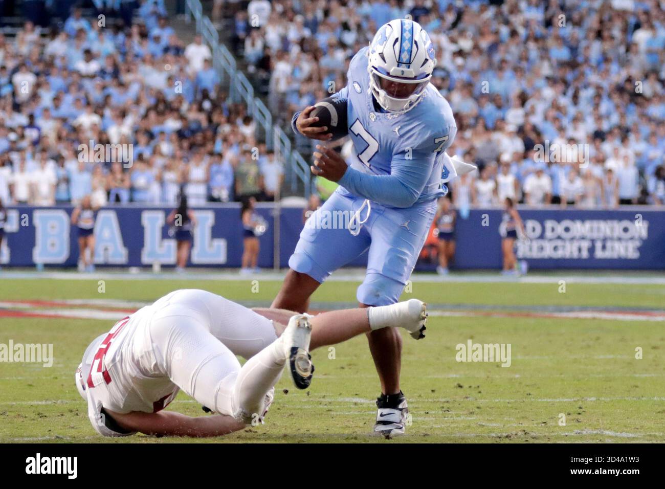 North Carolina quarterback Gio Lopez (7) gets hit by Stanford ...