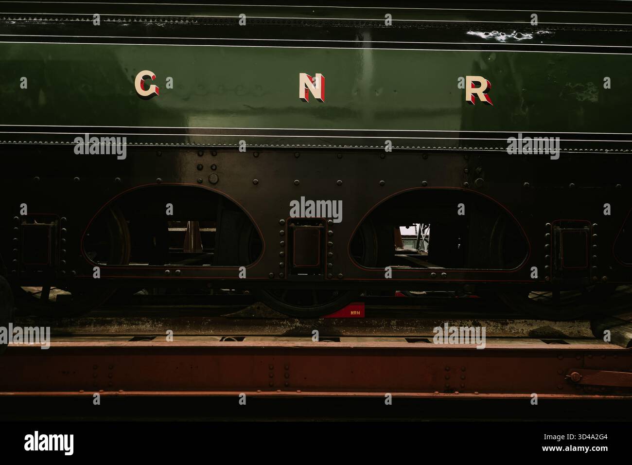 Close-up detail of LNER carriage wheels and undercarriage at railway ...
