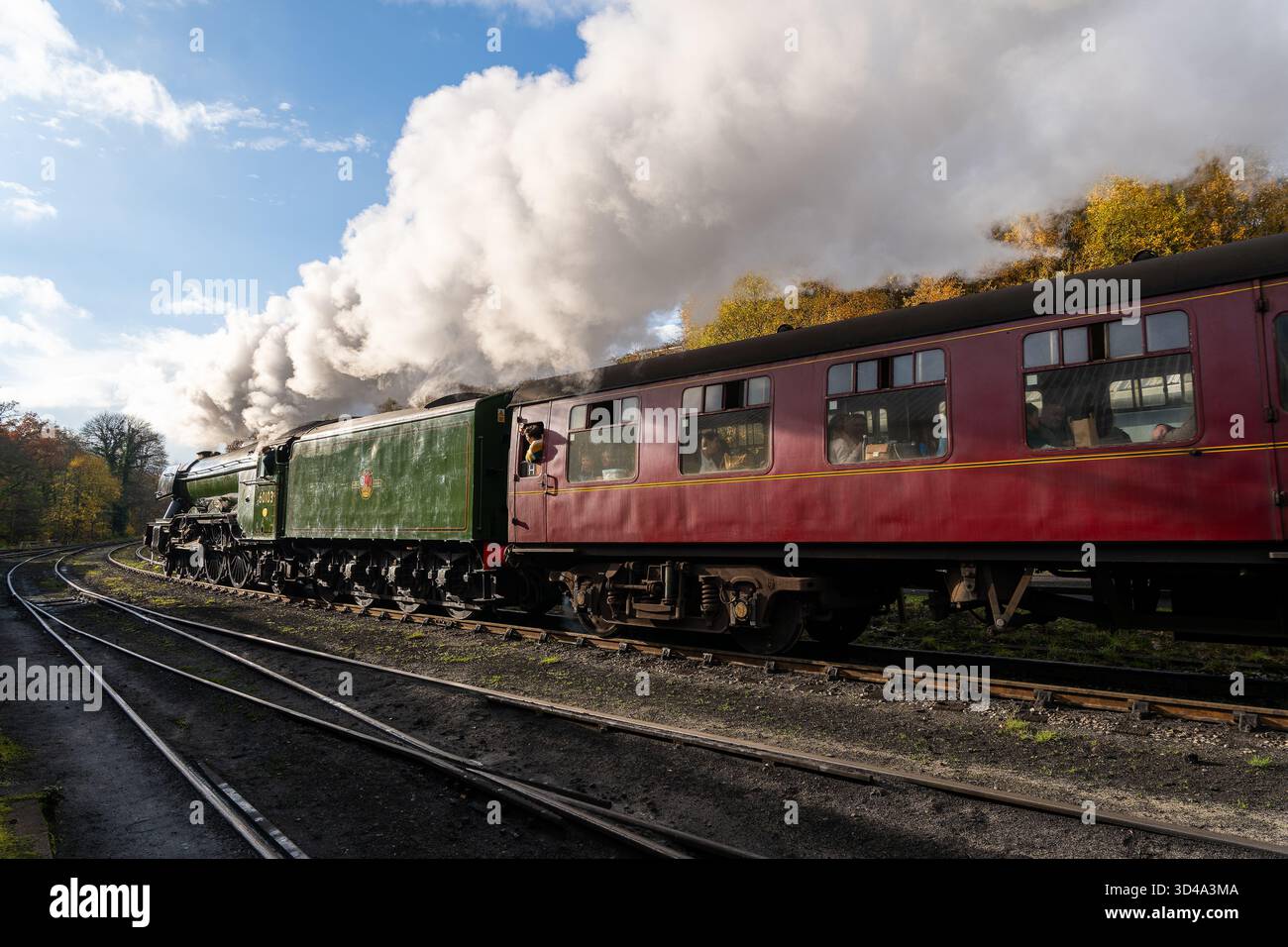 Flying Scotsman steam locomotive with maroon carriages on North ...
