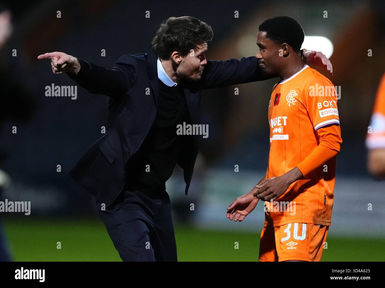 Rangers manager Danny Rohl (left) with player Jayden Meghoma after the ...