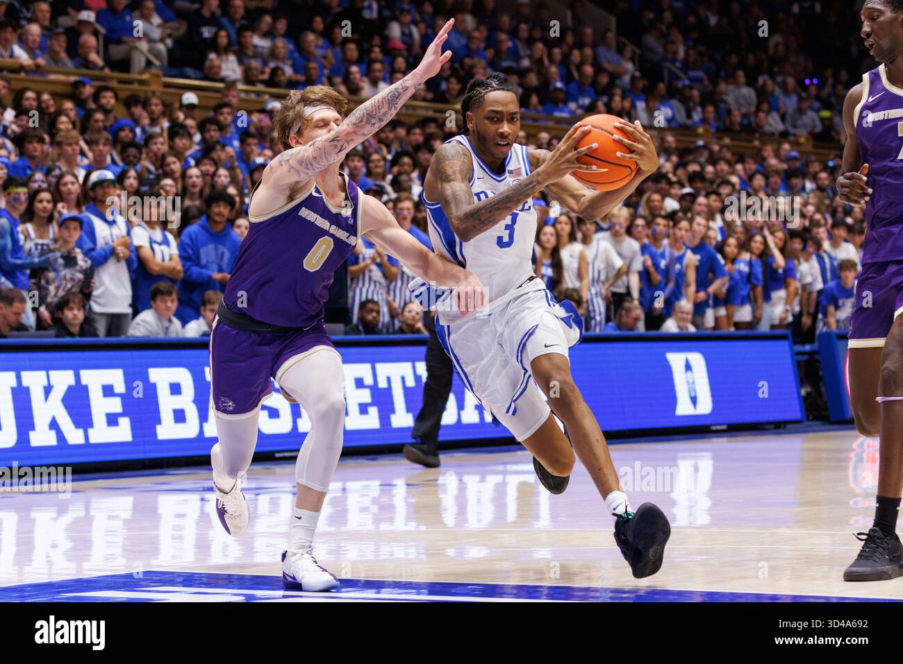 Duke's Isaiah Evans (3) drives against Western Carolina's Cord ...