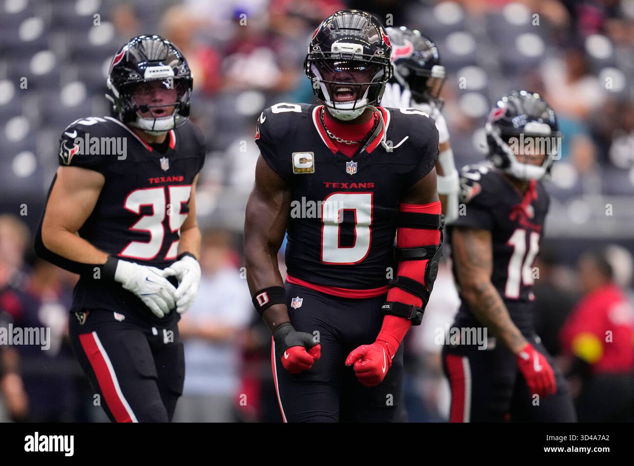 Houston Texans linebacker Azeez Al-Shaair (0) warms up before an NFL ...