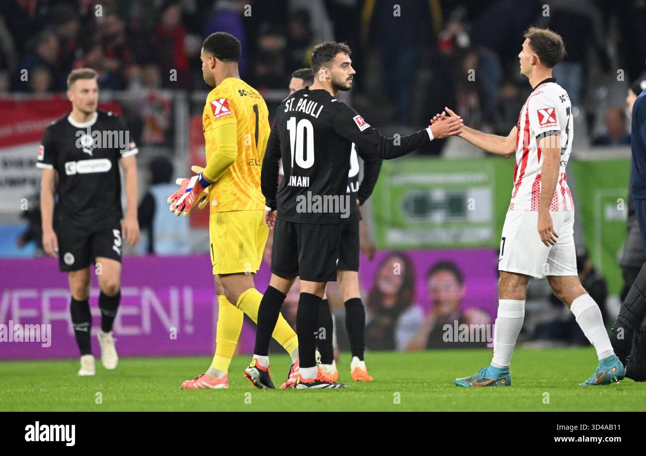 from left: goalkeeper Noah Atubolu (Freiburg), Danel Sinani (St. Pauli ...