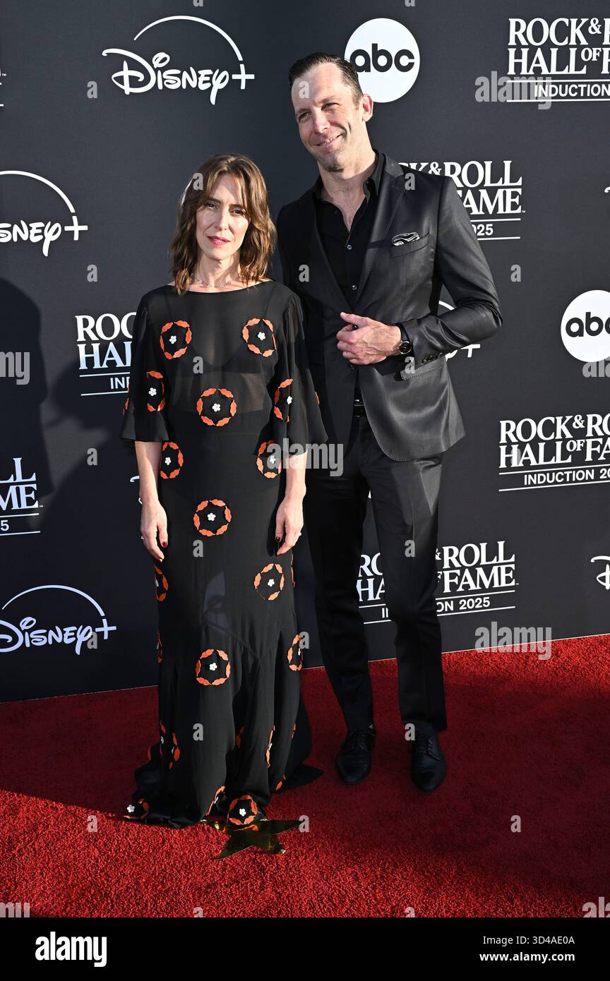 Feist and guest at the 40th Rock & Roll Hall of Fame Induction Ceremony ...