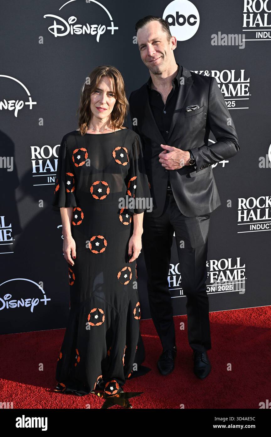 Feist and guest at the 40th Rock & Roll Hall of Fame Induction Ceremony ...