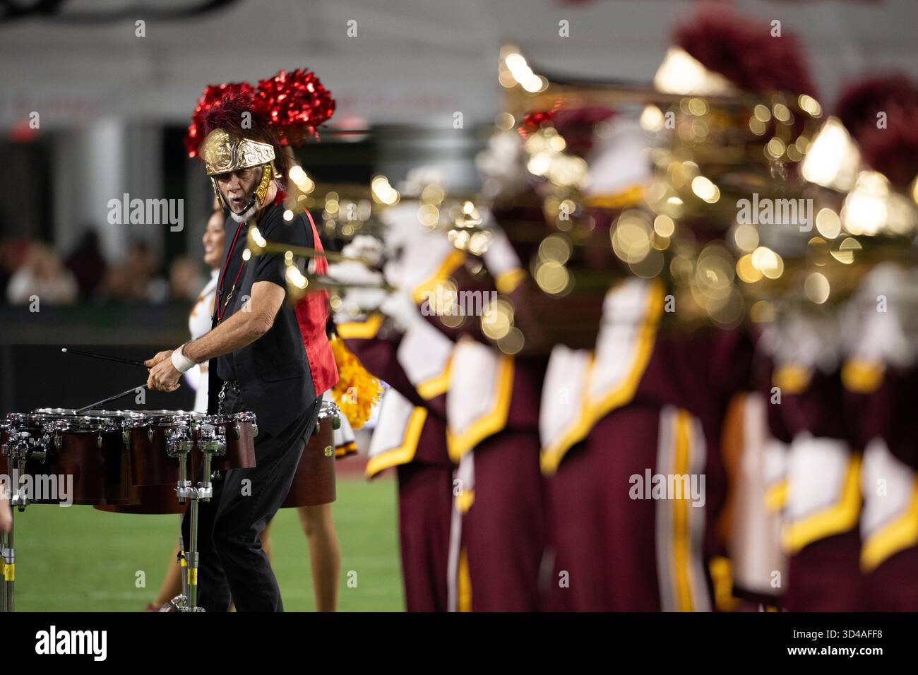 Mick Fleetwood performs with Southern California marching band before an NCAA football game ...