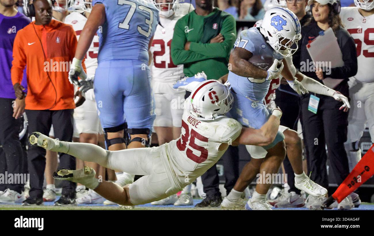 North Carolina running back Davion Gause (37) gets hit by Stanford ...