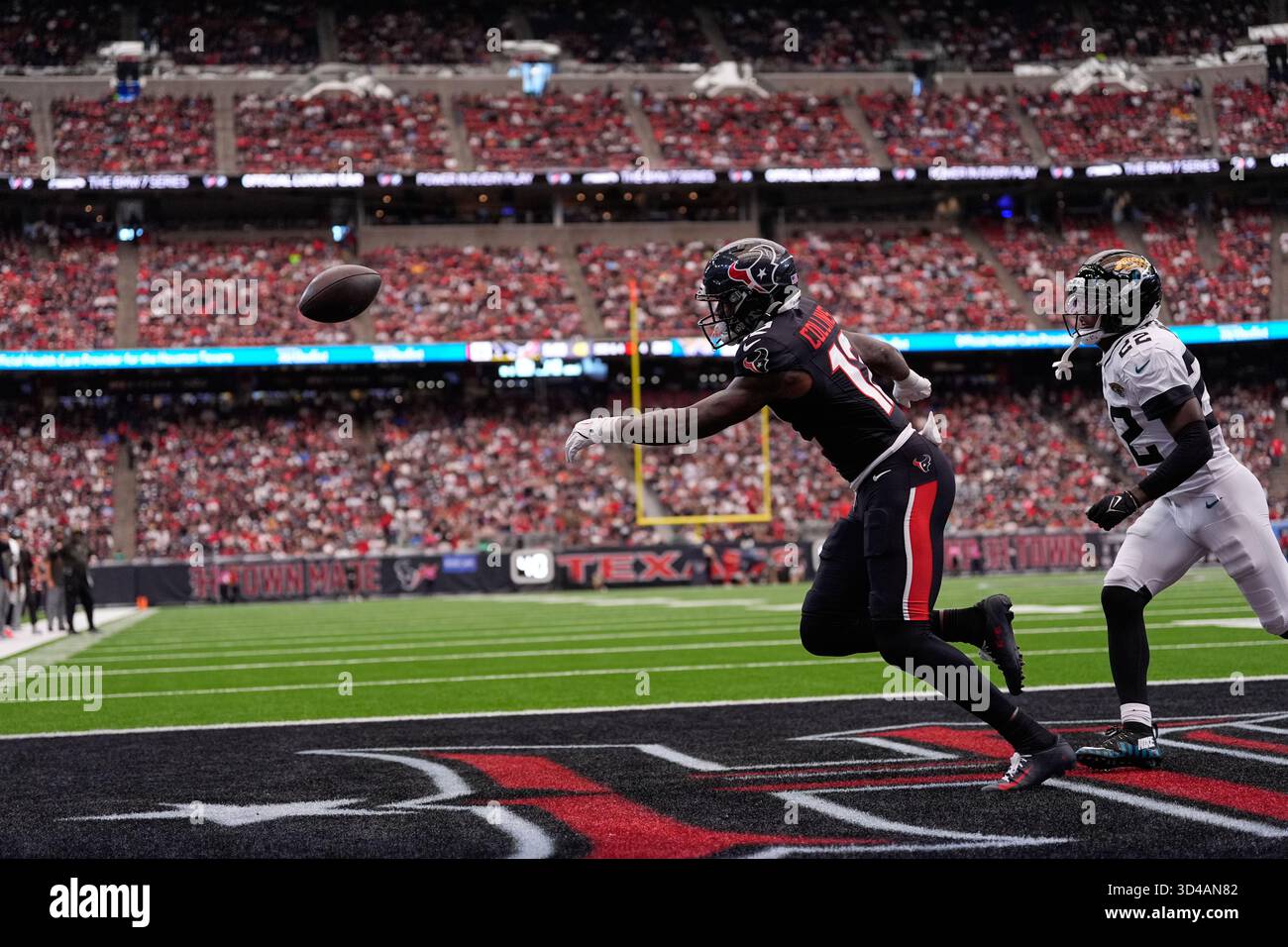 Houston Texans wide receiver Nico Collins (12) misses a pass during an ...