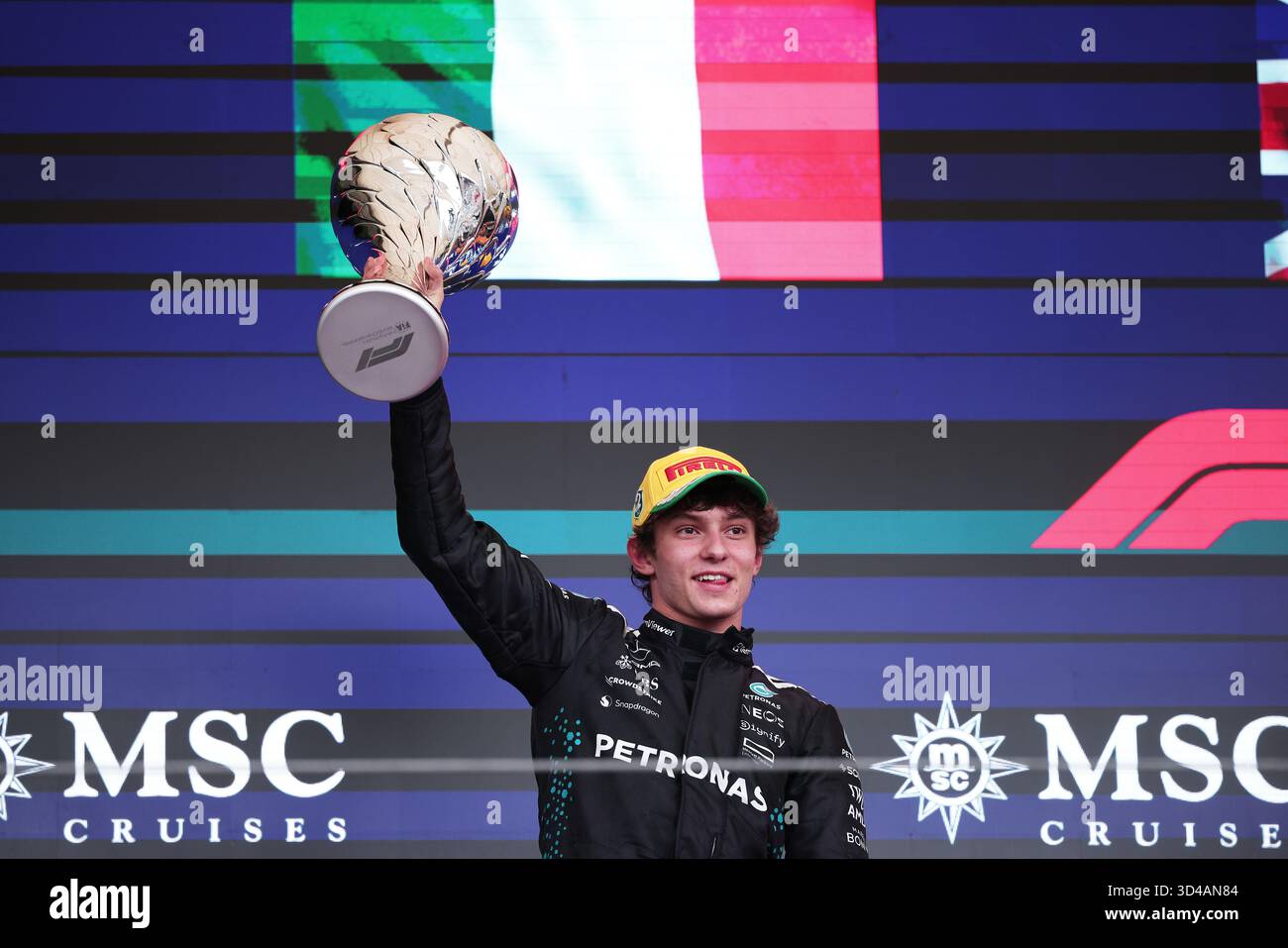 Mercedes driver Kimi Antonelli of Italy celebrates on the podium his ...