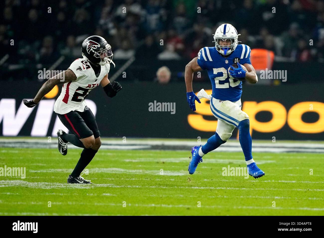 Indianapolis Colts running back Jonathan Taylor (28) is chased by ...