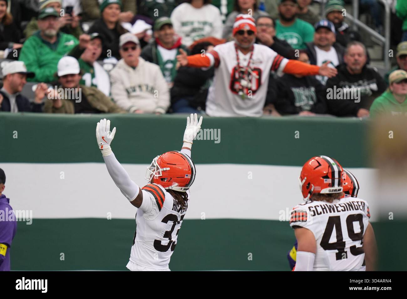 Cleveland Browns safety Ronnie Hickman (33) celebrates with fans after ...