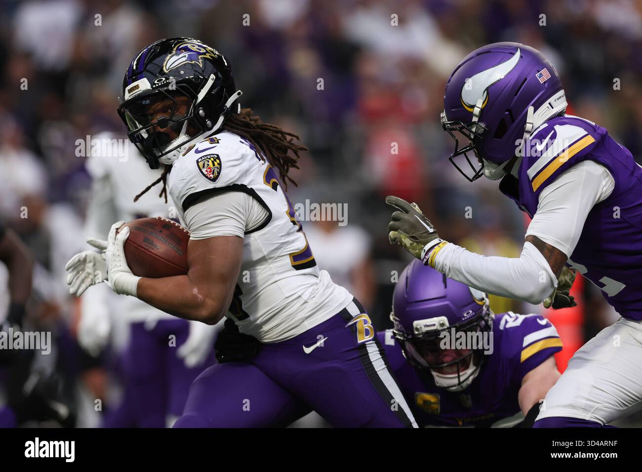 Baltimore Ravens running back Keaton Mitchell (34) carries the ball ...