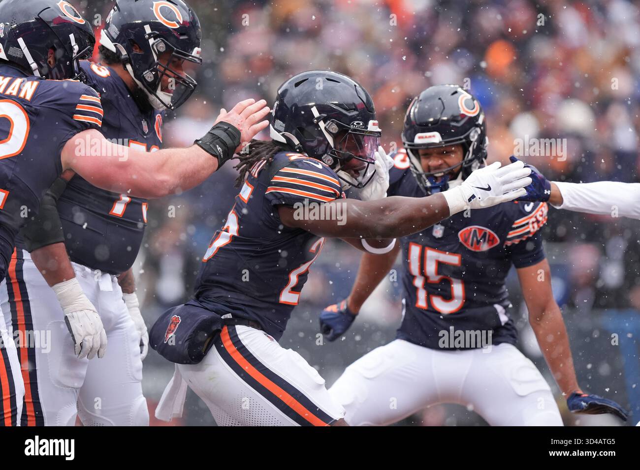 Chicago Bears running back Kyle Monangai, center, celebrates with ...