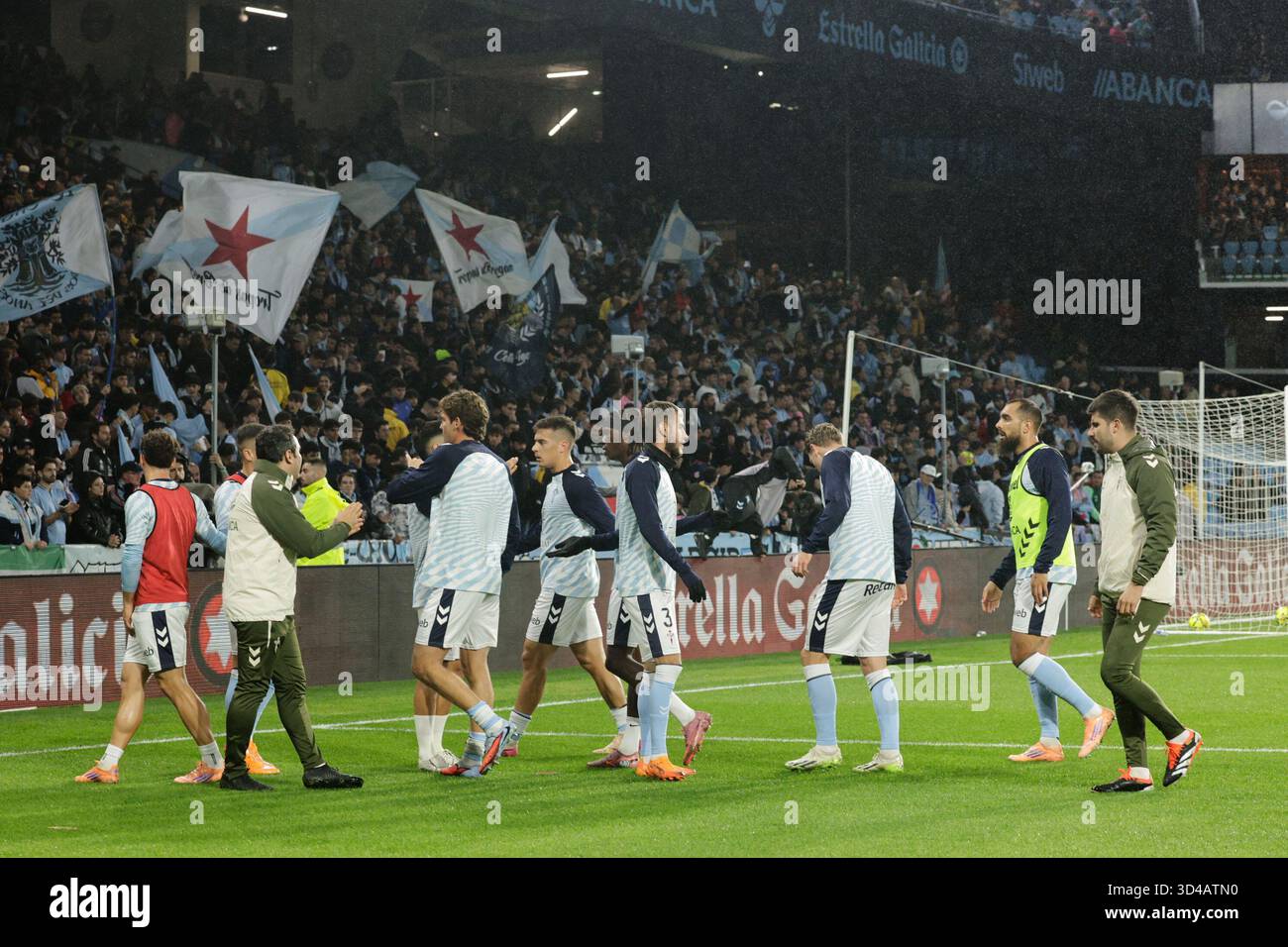 Celta Vigo's players warm up prior to the Spanish La Liga soccer match ...